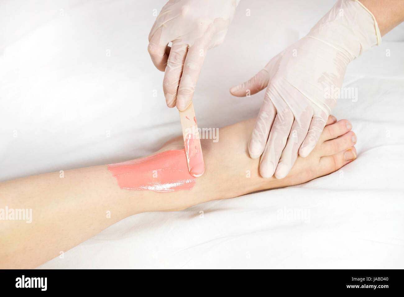 Process depilation female legs and hands in a beauty salon Stock Photo ...