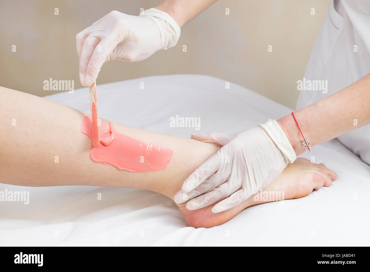 Process depilation female legs and hands in a beauty salon Stock Photo ...