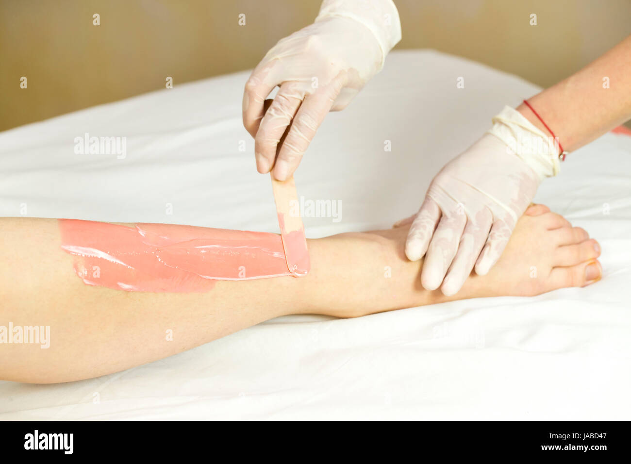 Process depilation female legs and hands in a beauty salon Stock Photo ...