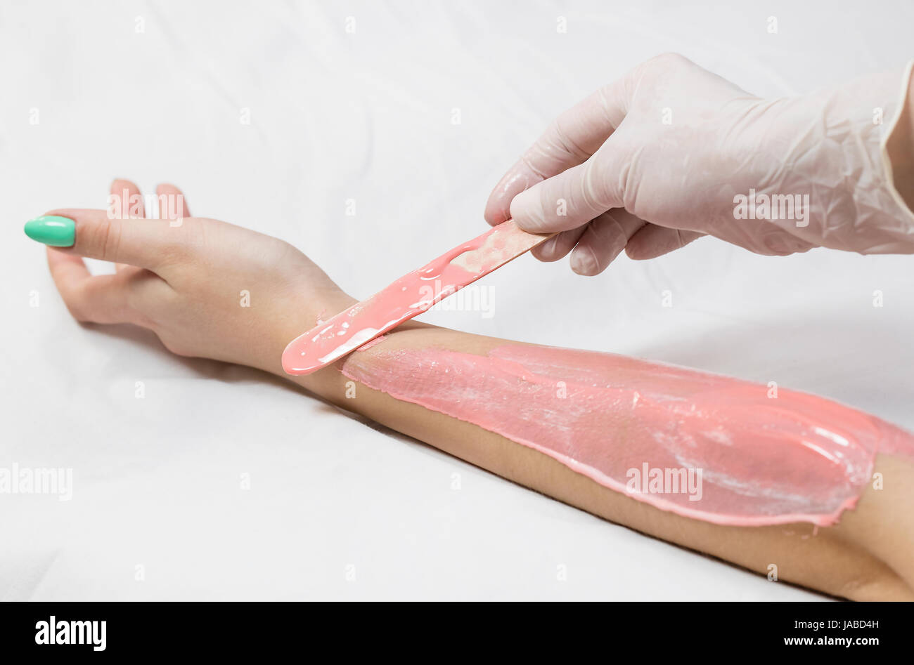 Process depilation female legs and hands in a beauty salon Stock Photo ...