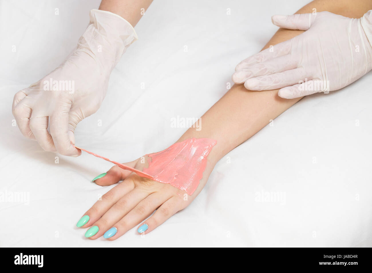 Process depilation female legs and hands in a beauty salon Stock Photo ...