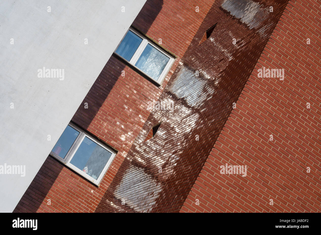Diagonal composition of building facade. Tiles glossy wall facade of ...