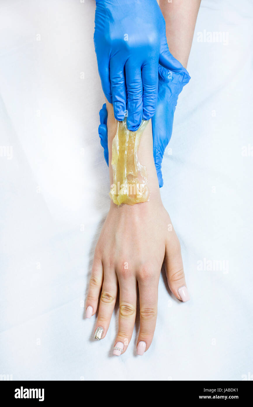 Epilation sugar processes woman passes hi-res stock photography and ...