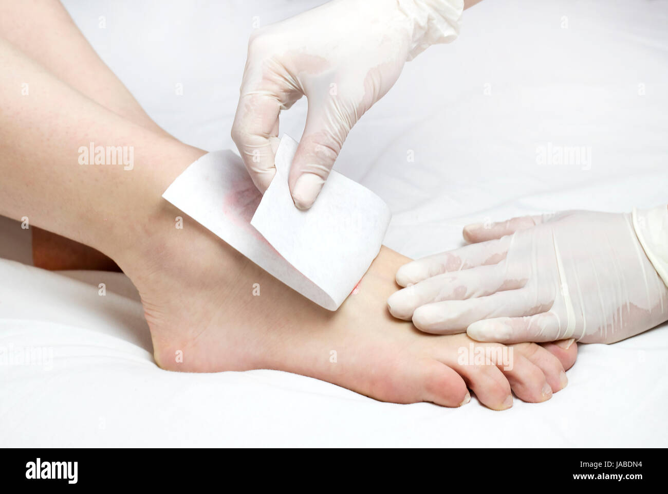 Process depilation female legs and hands in a beauty salon Stock Photo ...