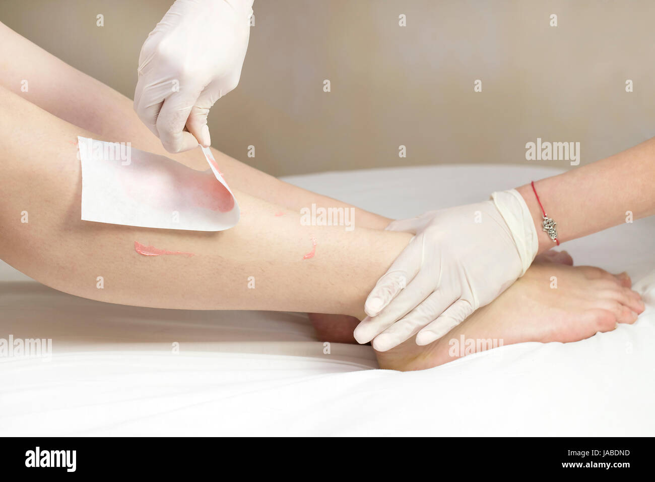 Process depilation female legs and hands in a beauty salon Stock Photo ...
