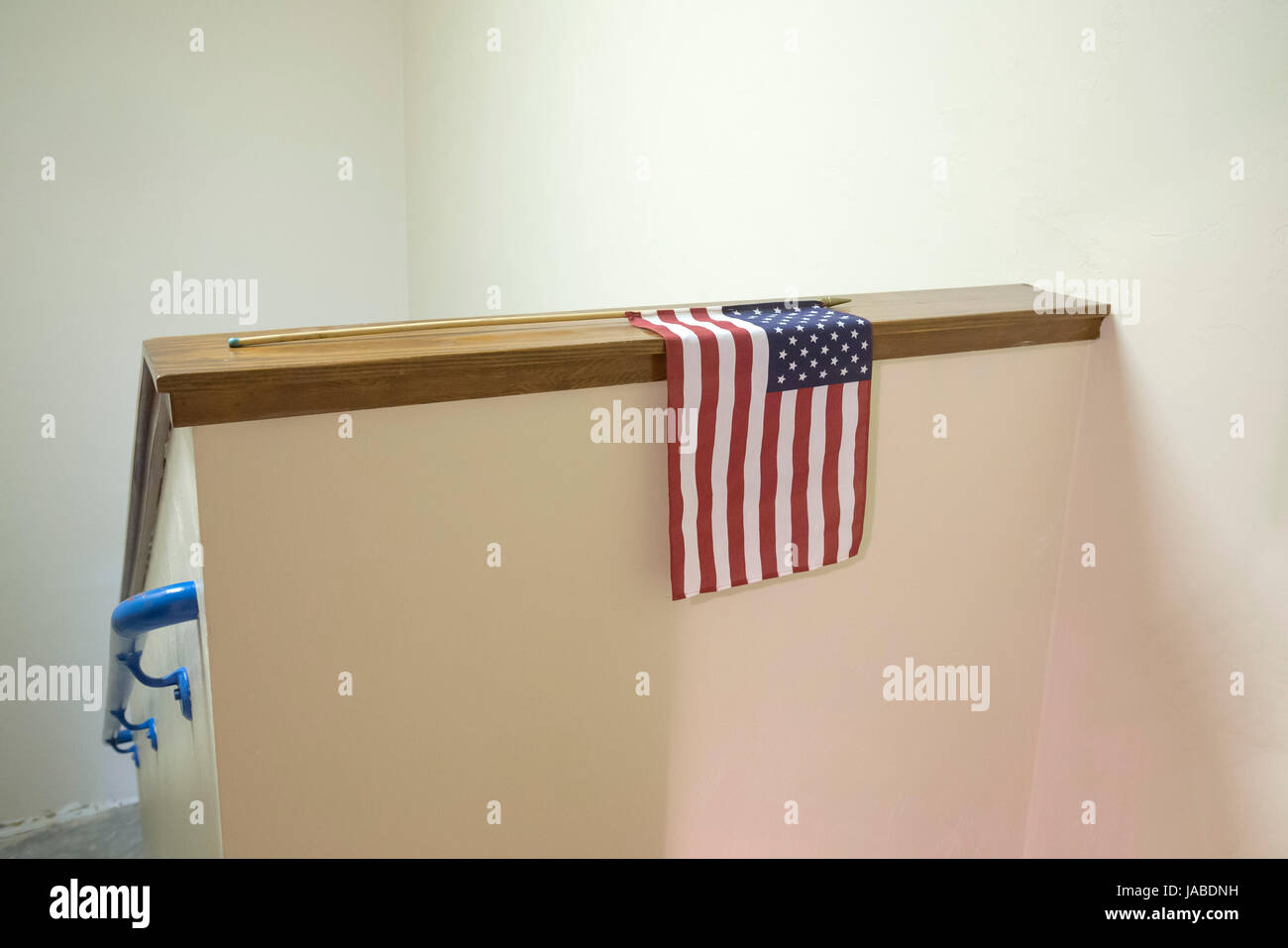 American flag draped in stairwell Stock Photo - Alamy