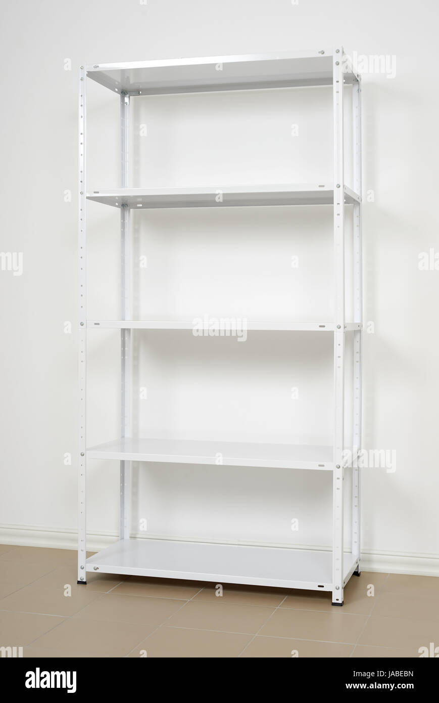 white metal rack near the wall, empty shelves Stock Photo - Alamy