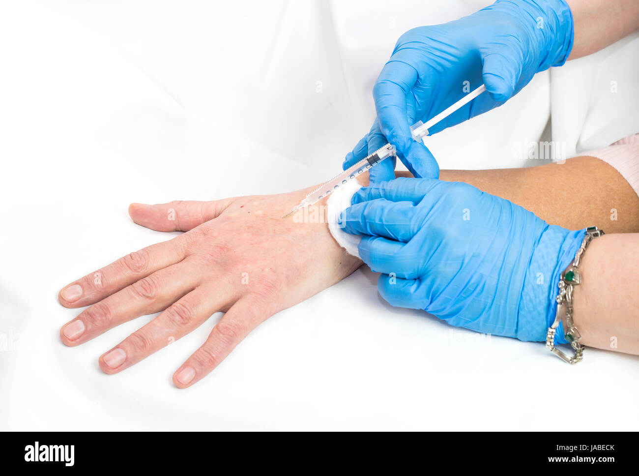 Mesotherapy process on a female hand in clinic Stock Photo - Alamy