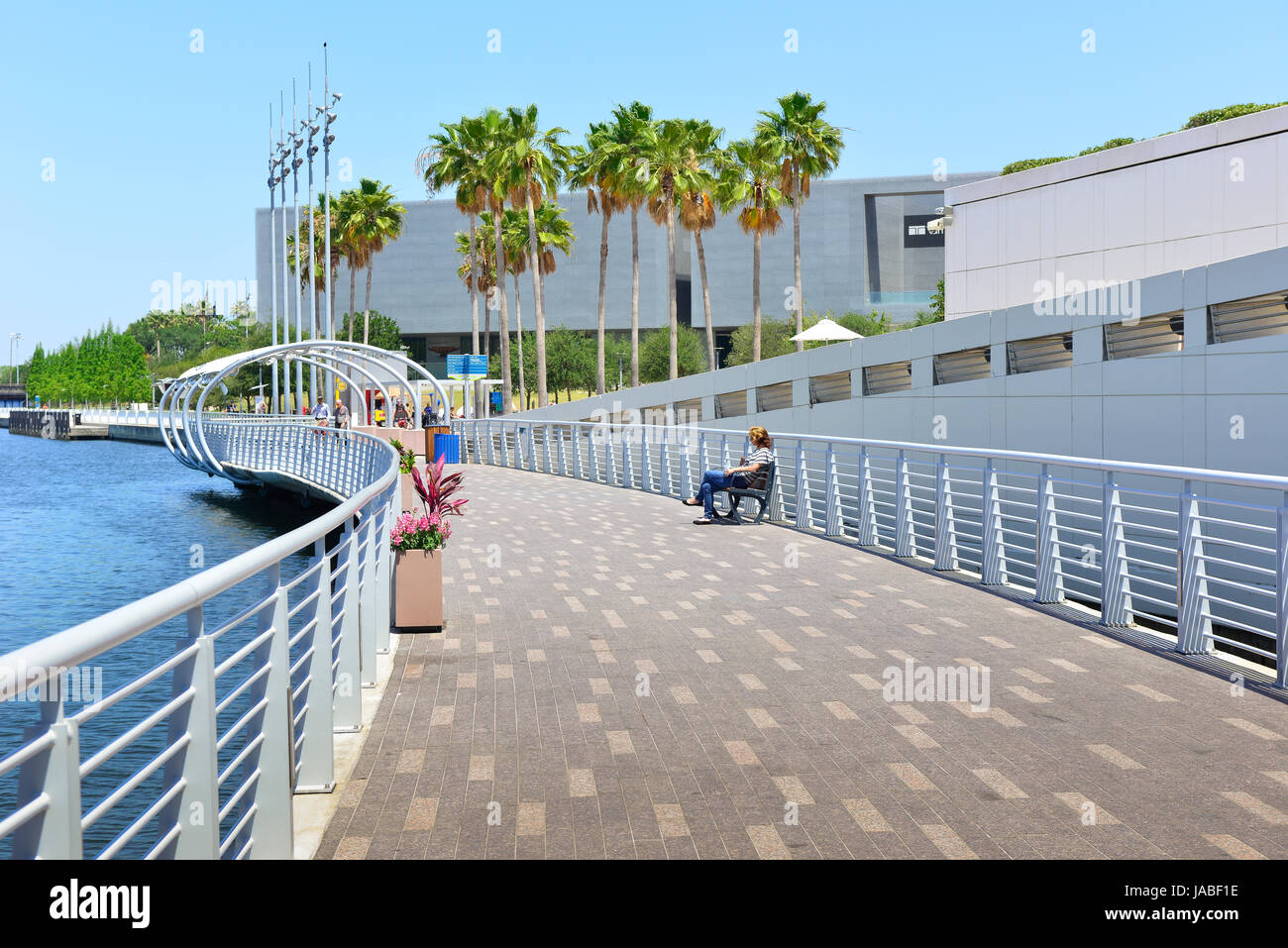 The Tampa River Walk along the Hillsborough River with benches for ...