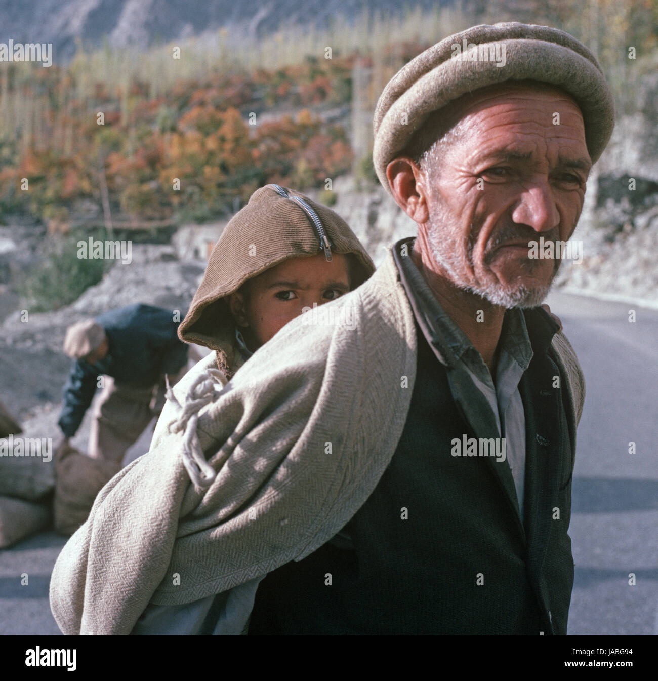Tribesman with child in Hunza Valley, Gilgit-Baltistan Province ...