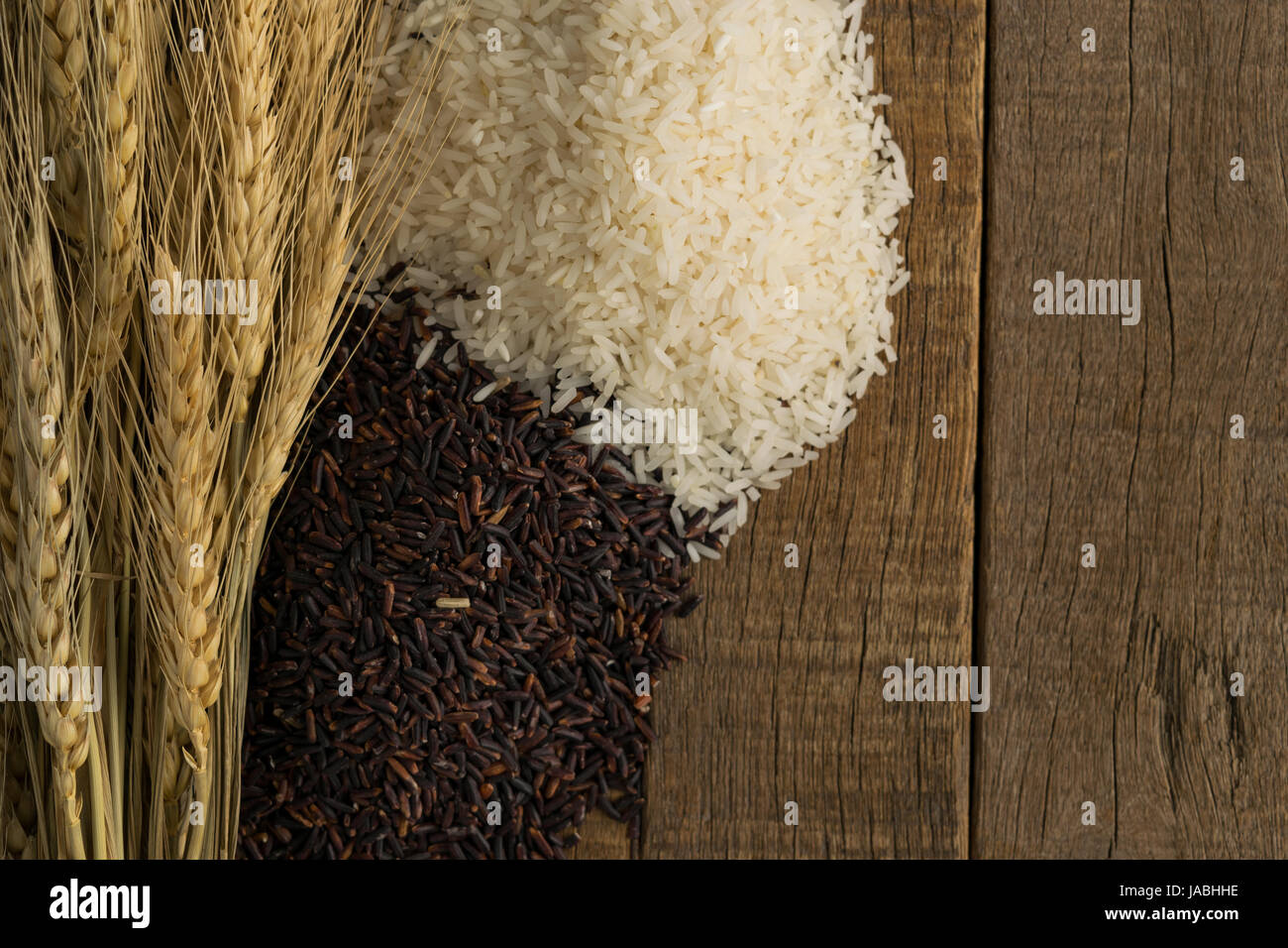 rice on table wood vintage background Stock Photo - Alamy