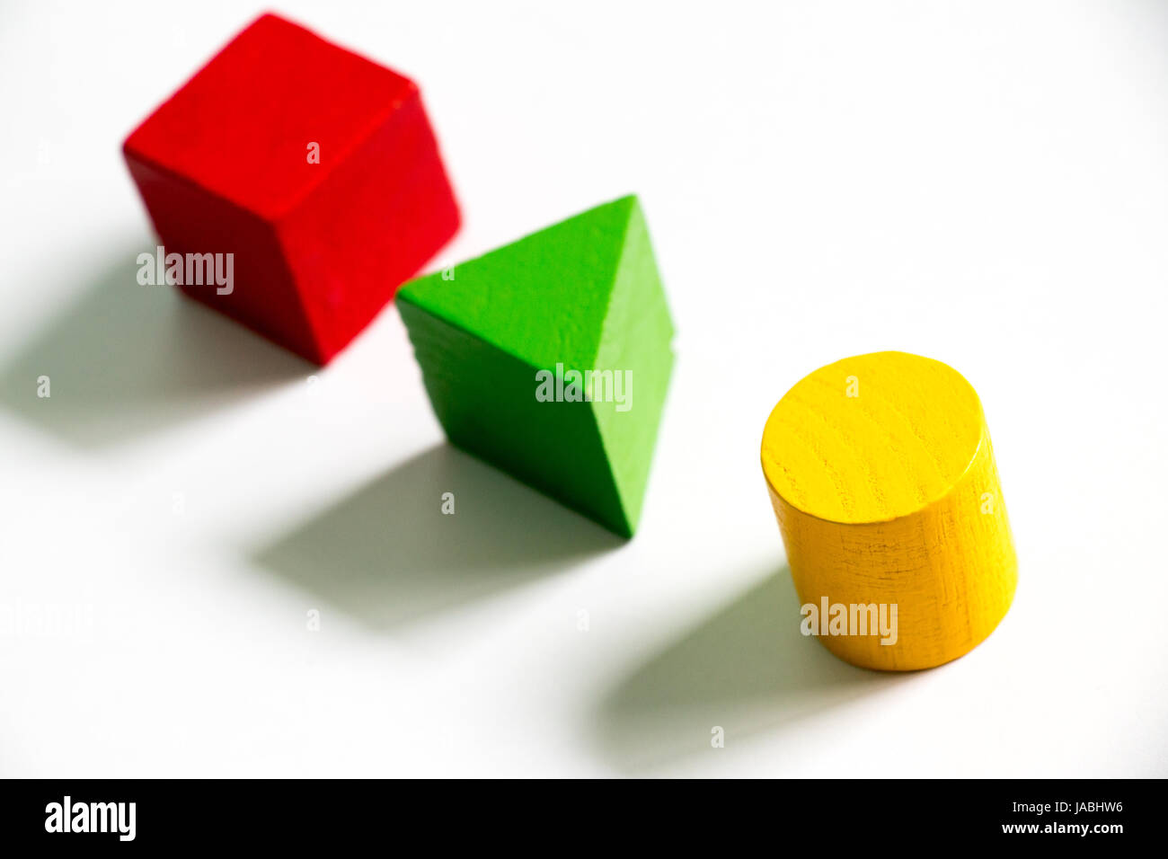 Set of colorful wooden shape toy (Square, triangle, round) on white ...