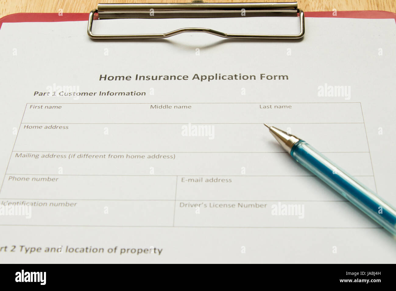 Home insurance application form with red file on wooden table Stock ...