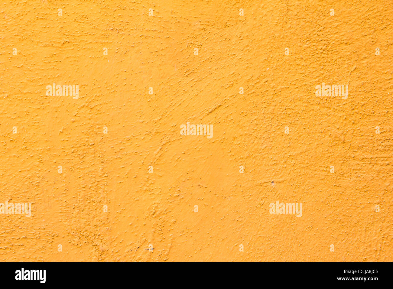 Orange color concrete wall background Stock Photo - Alamy