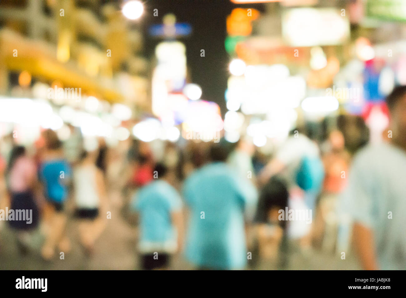 Blurred image of busy night life in the city Stock Photo - Alamy
