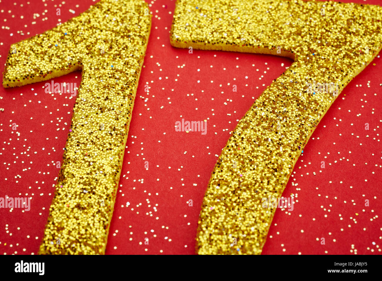 Number seventeen yellow color over a red background. Anniversary ...