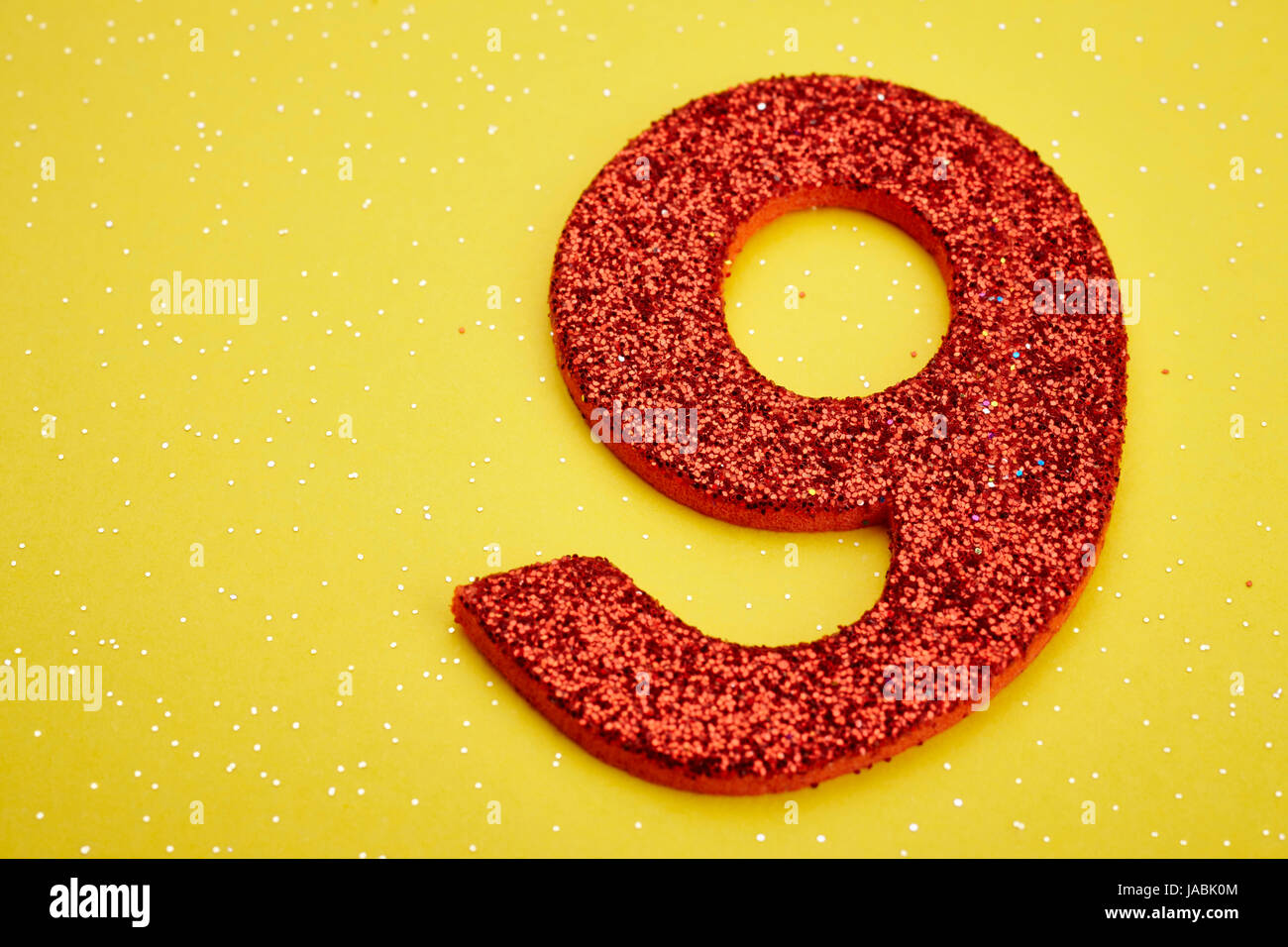 Number nine red color over a yellow background. Anniversary. Horizontal ...