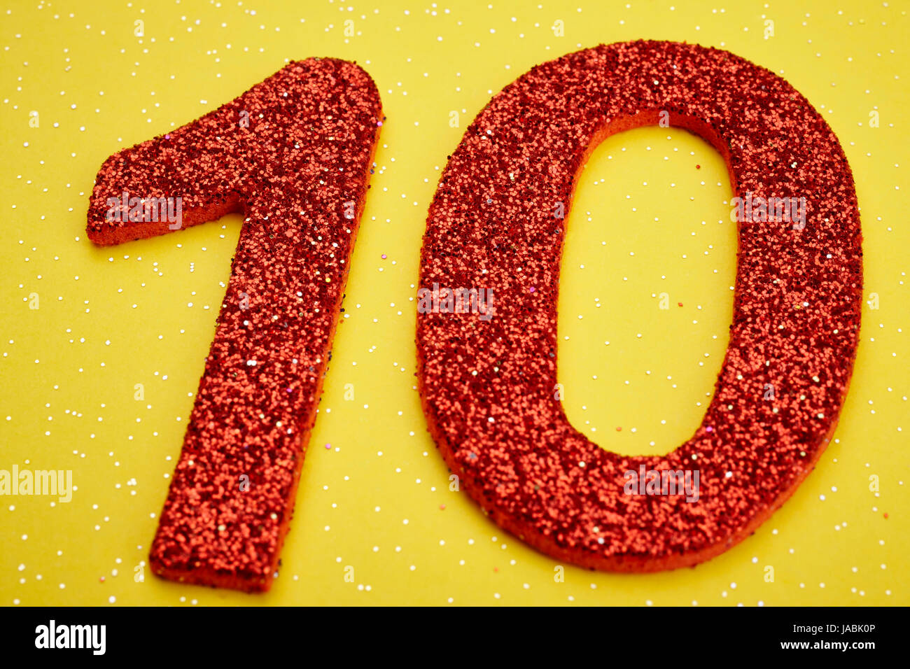Number ten red color over a yellow background. Anniversary. Horizontal ...