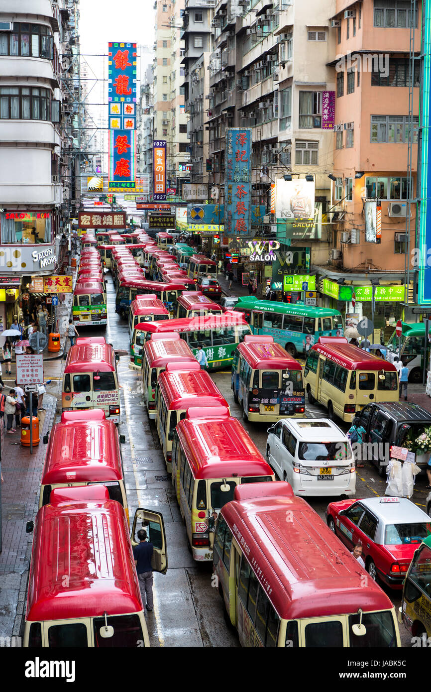 Hong Kong street, mini bus and signs everywhere Stock Photo - Alamy