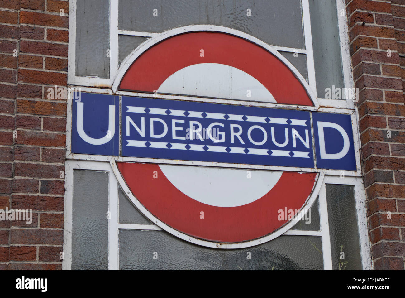 Old art-deco underground sign at East Finchley tube station in London ...