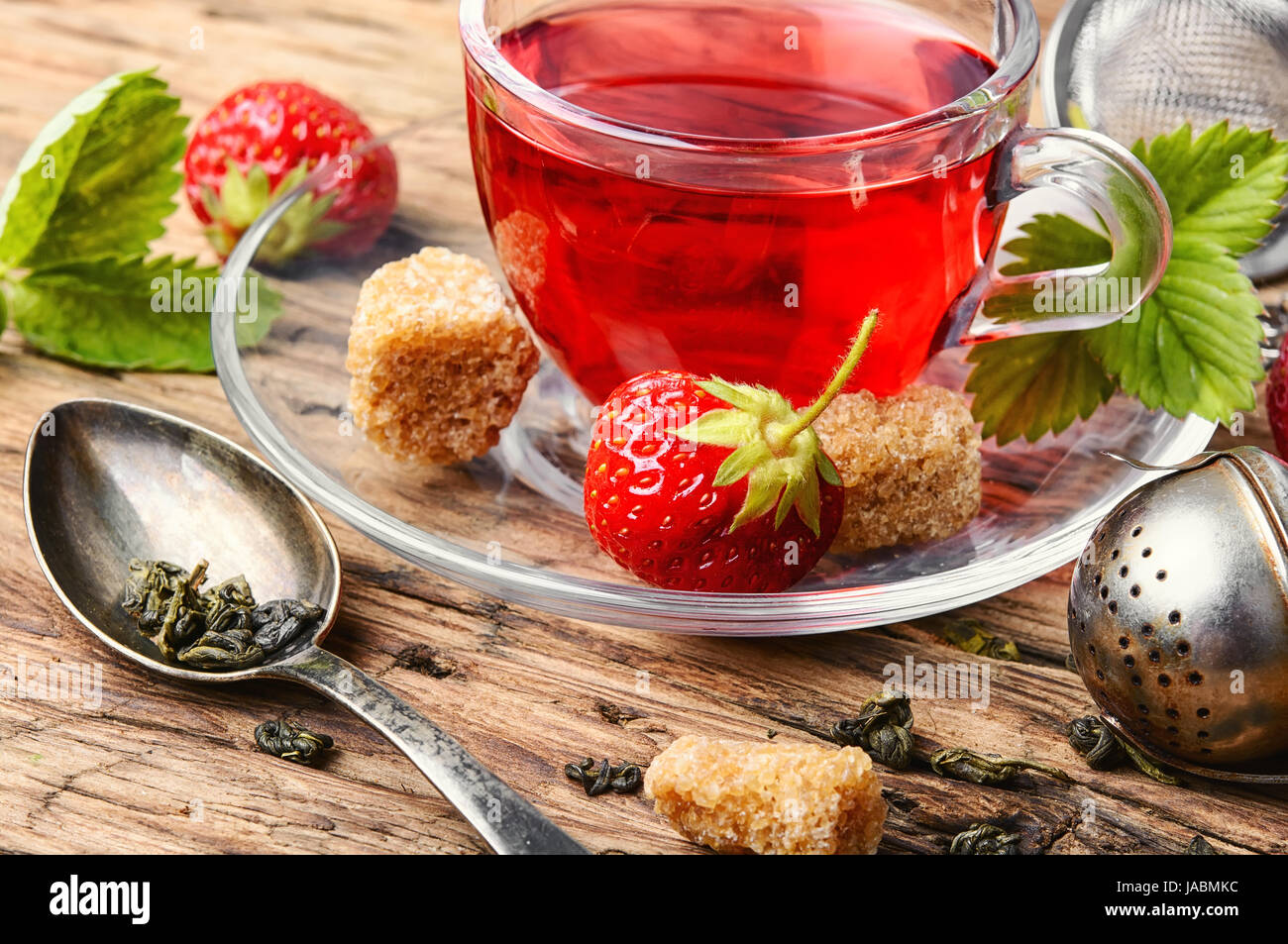 Summer fruit tea with strawberries in the rustic style Stock Photo - Alamy