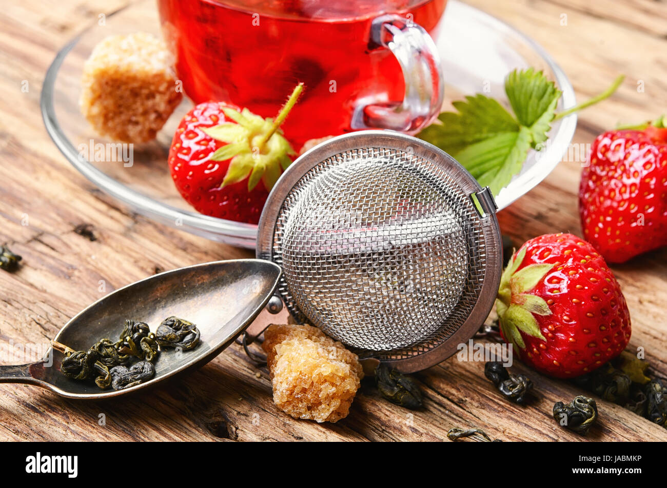 Summer fruit tea with strawberries in the rustic style Stock Photo - Alamy