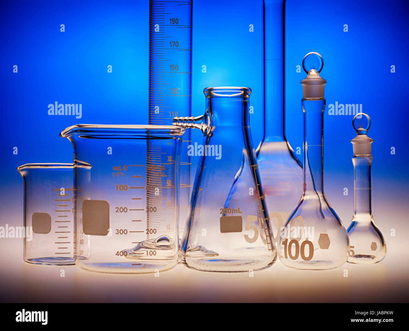 Different laboratory glassware and beakers Stock Photo - Alamy