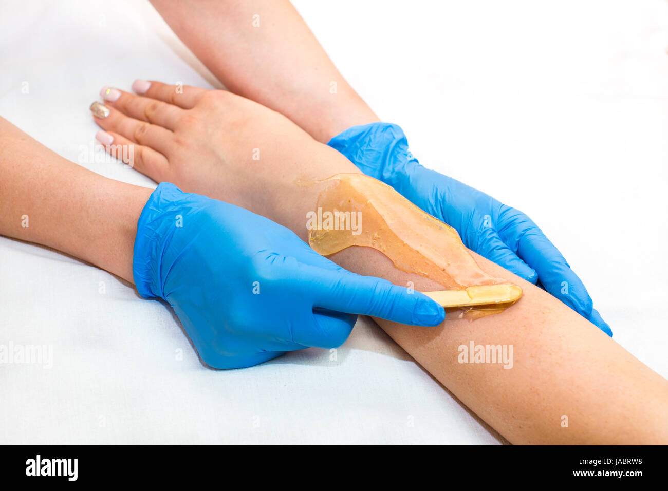 Depilation sugar processes woman hi-res stock photography and images ...
