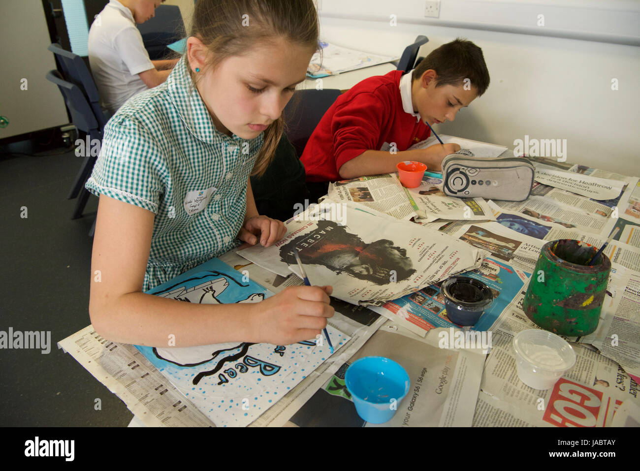 School pupils designing conservation posters Stock Photo - Alamy