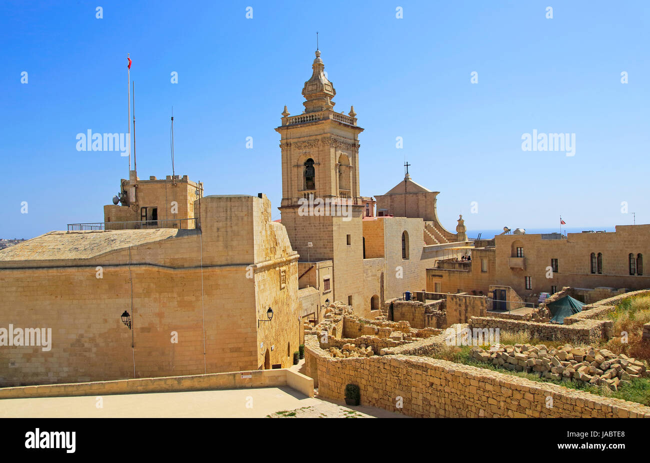 Cathedral church tower and ruins inside citadel castle walls Il-Kastell ...