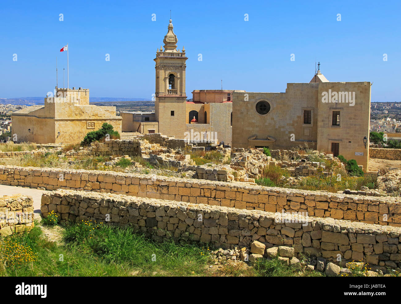 Cathedral church tower and ruins inside citadel castle walls Il-Kastell ...