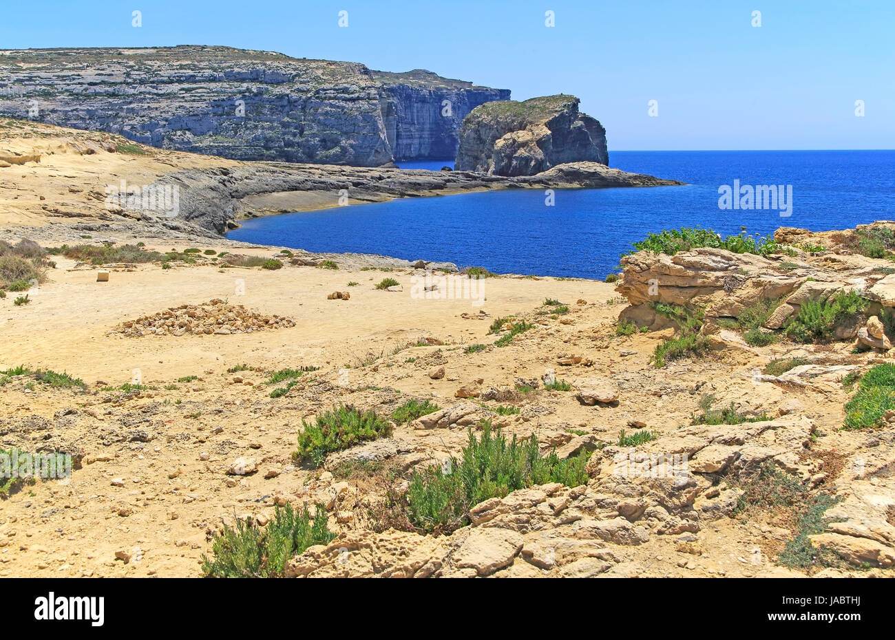 Coastal scenery cliffs view to Fungus Rock, Dwerja Bay, island of Gozo ...