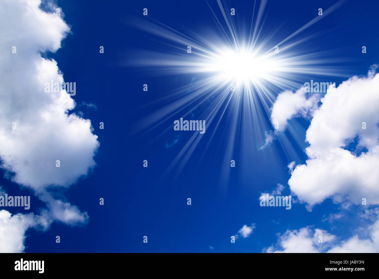 Blue sky with clouds and sun. White clouds in blue sky Stock Photo - Alamy