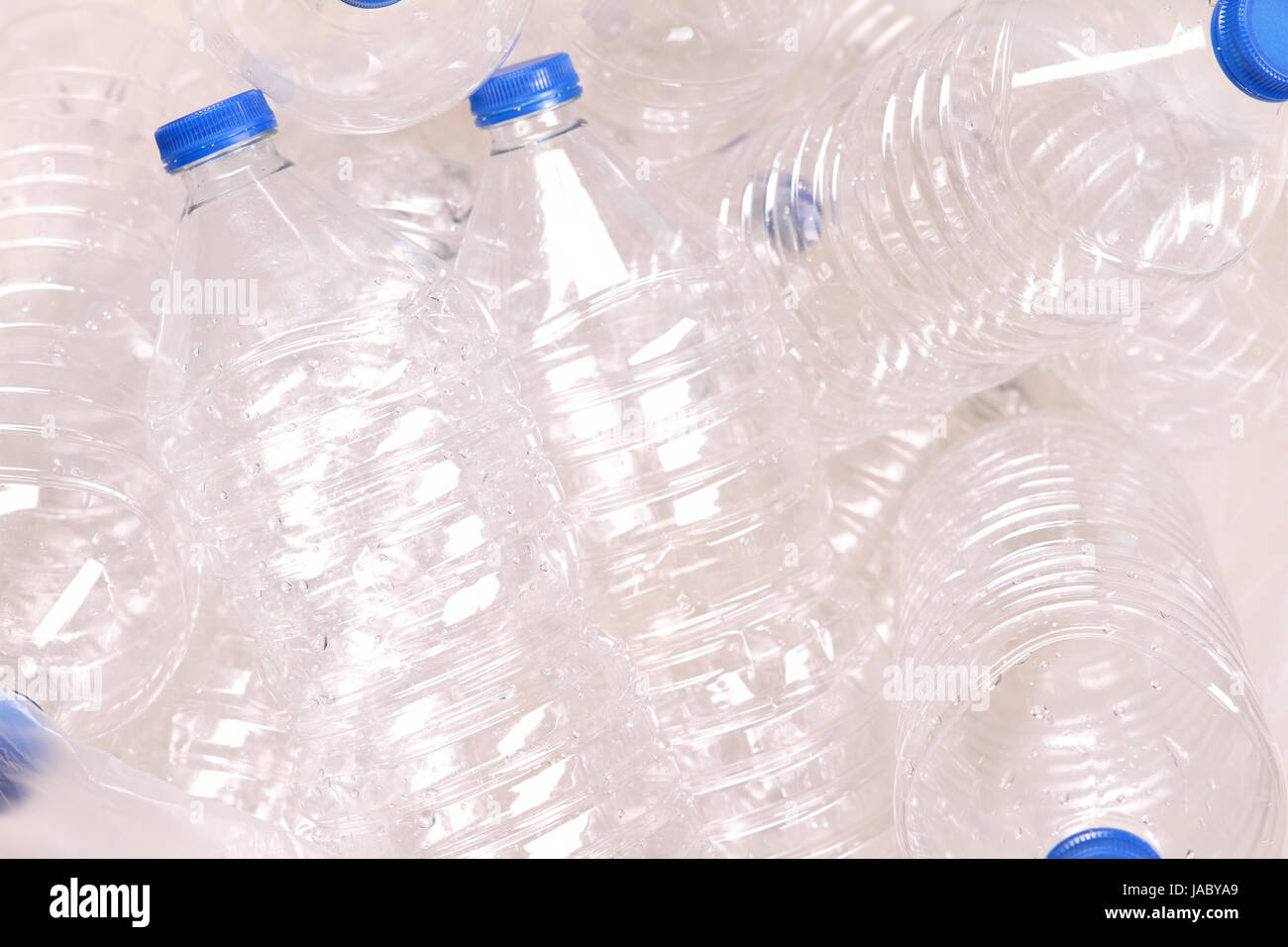 Bottles of water for recycling background Stock Photo - Alamy