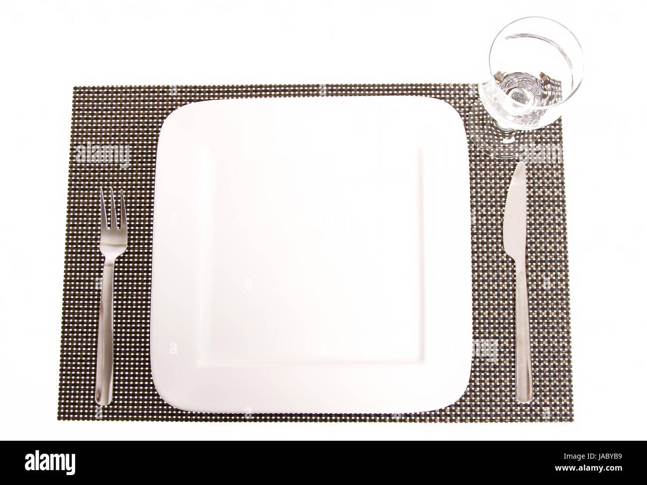 Simple Table set on a placemat Stock Photo - Alamy