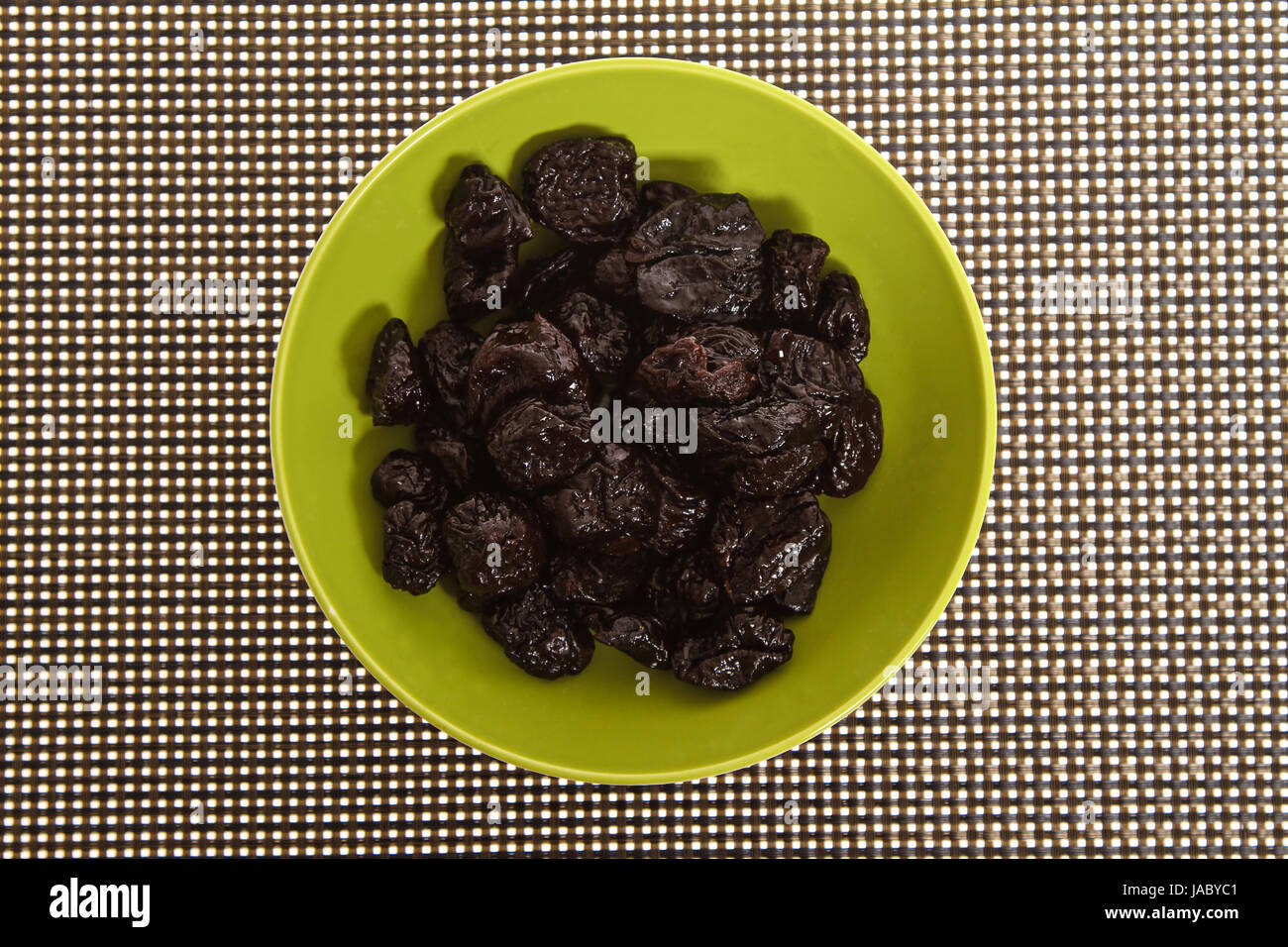 A pile of prunes on a bowl Stock Photo - Alamy
