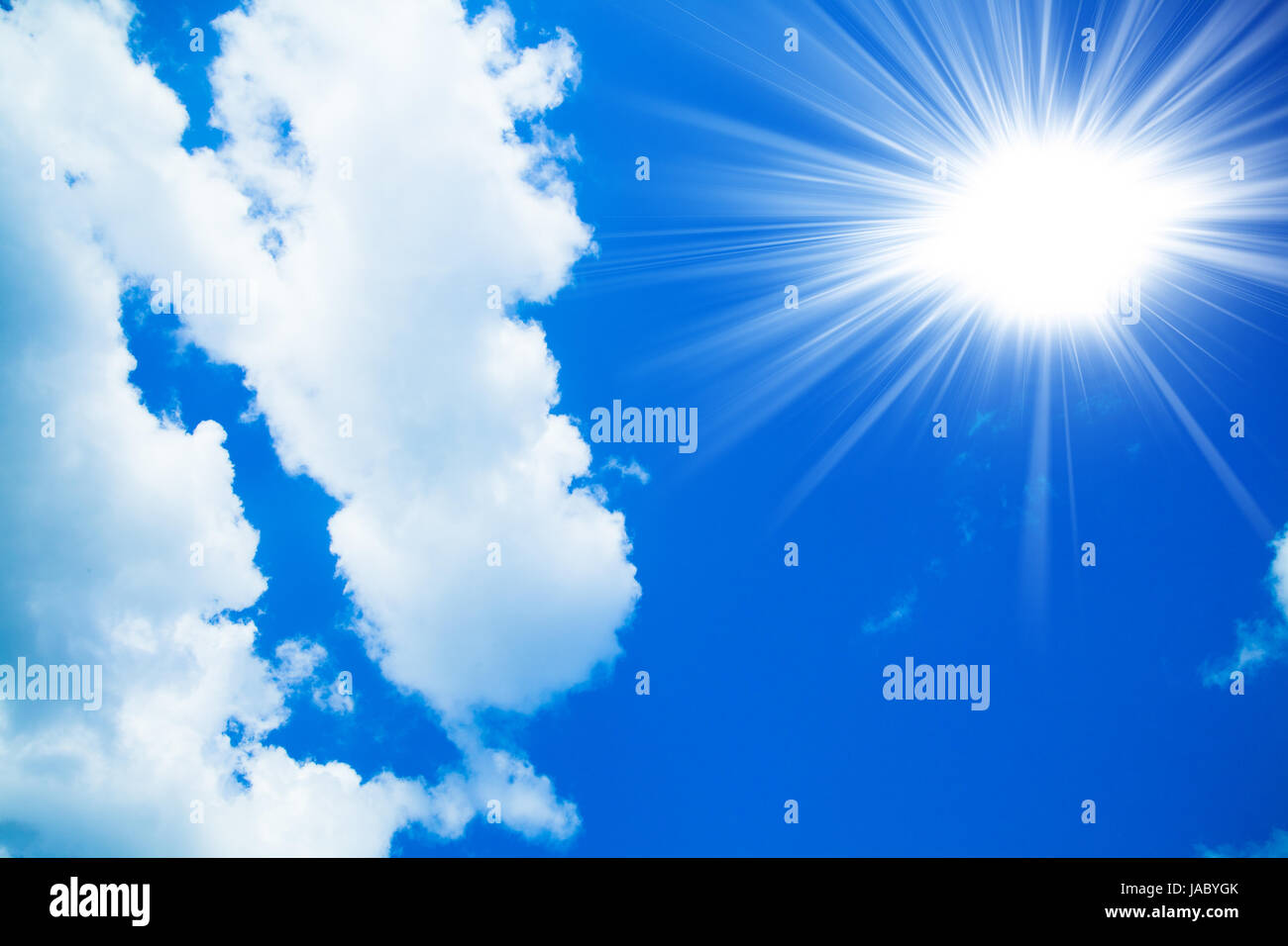 Blue sky with clouds and sun. White clouds in blue sky Stock Photo - Alamy