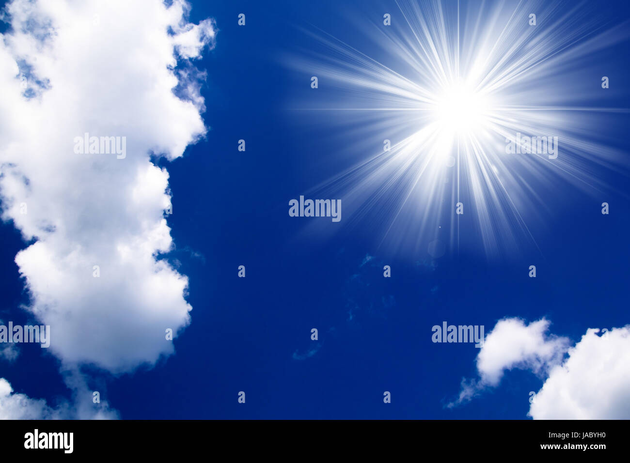 Blue sky with clouds and sun. White clouds in blue sky Stock Photo - Alamy
