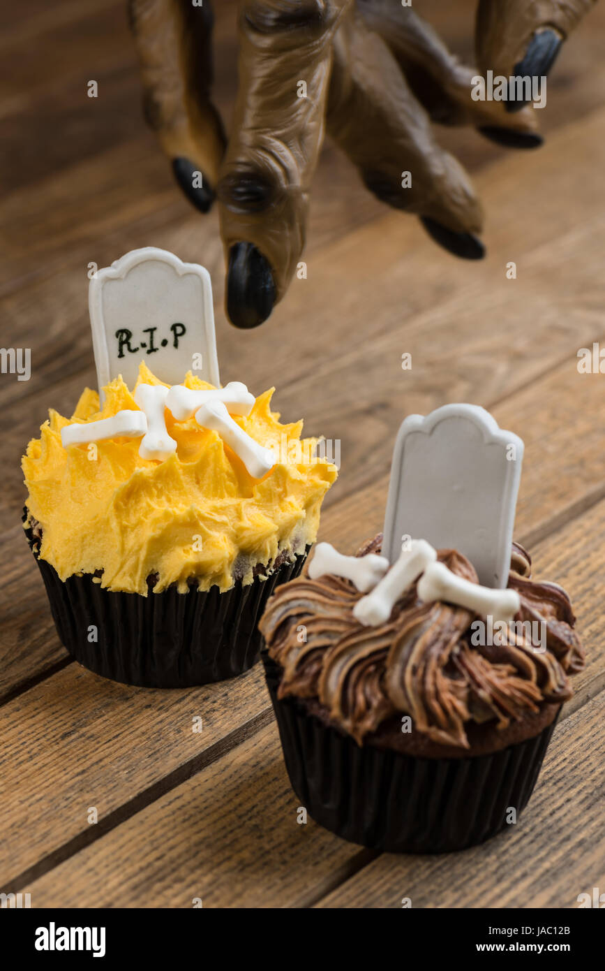 Werewolf hand reaching for a Halloween cup Stock Photo - Alamy