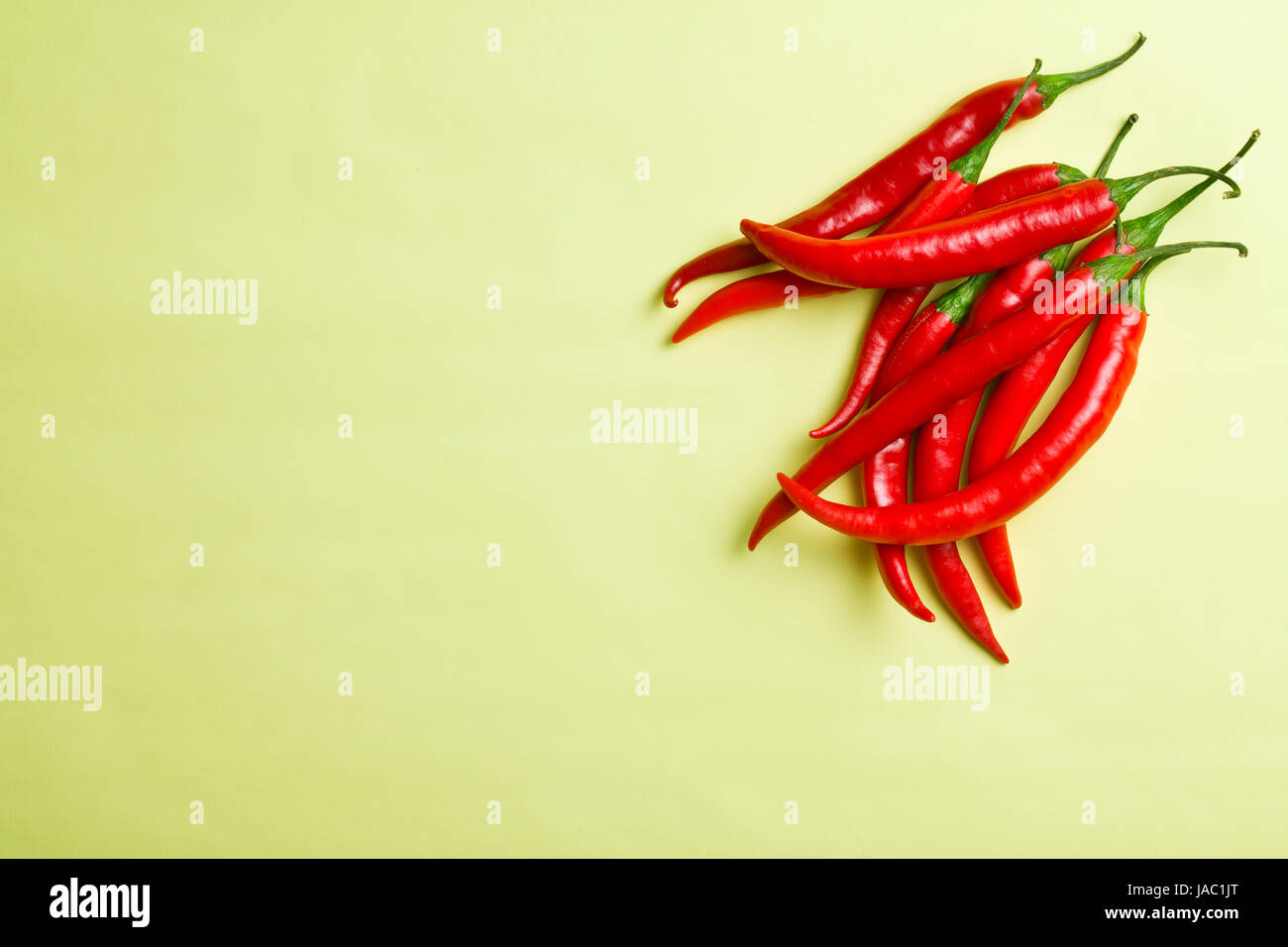 top view of chili peppers on colorful background Stock Photo - Alamy
