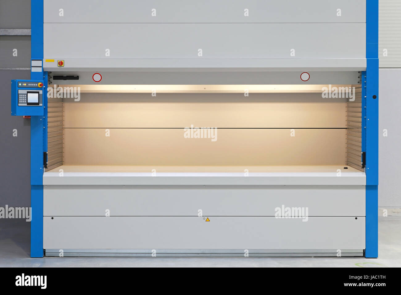 High density carousel storage in distribution warehouse Stock Photo - Alamy