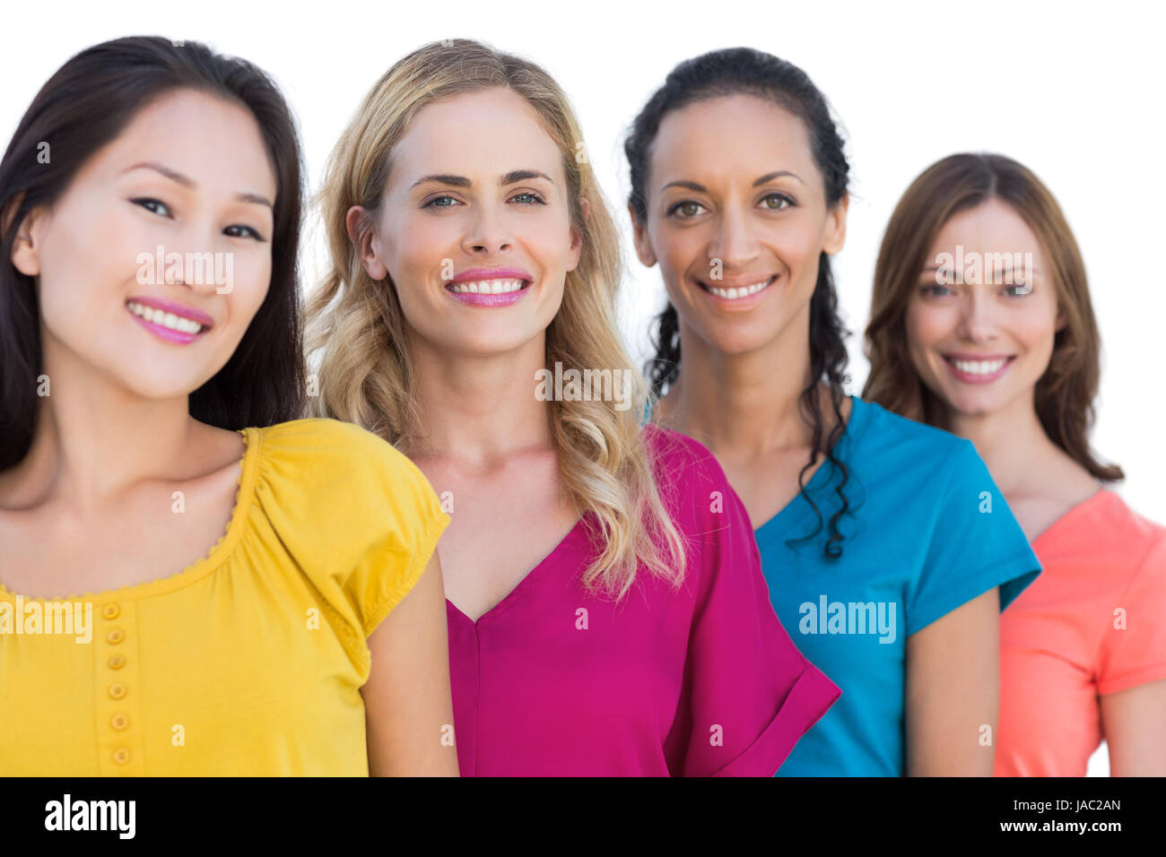 Cheerful models posing and looking at camera on white background Stock ...