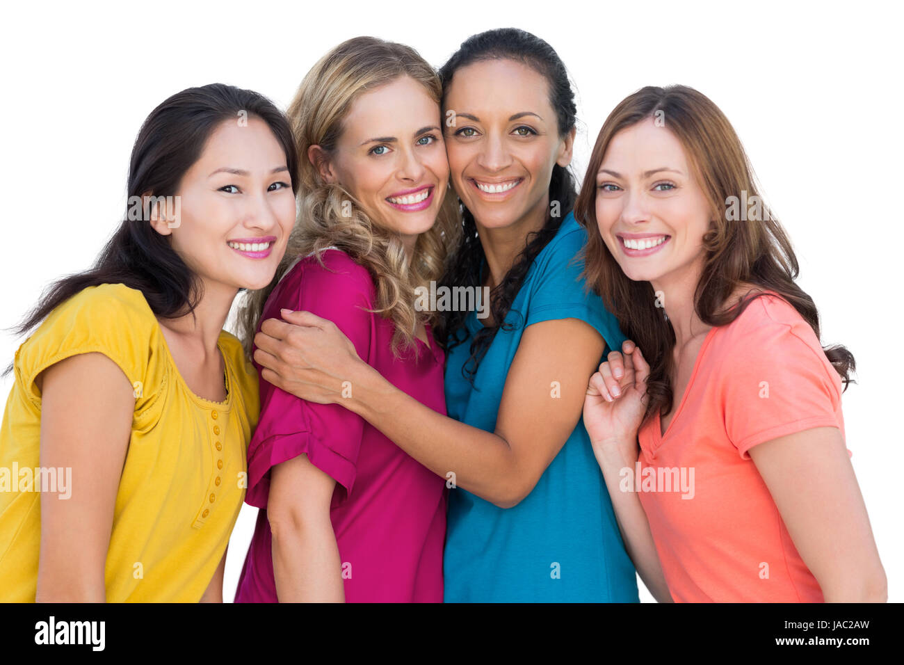 Cheerful models posing hugging each other on white background Stock ...