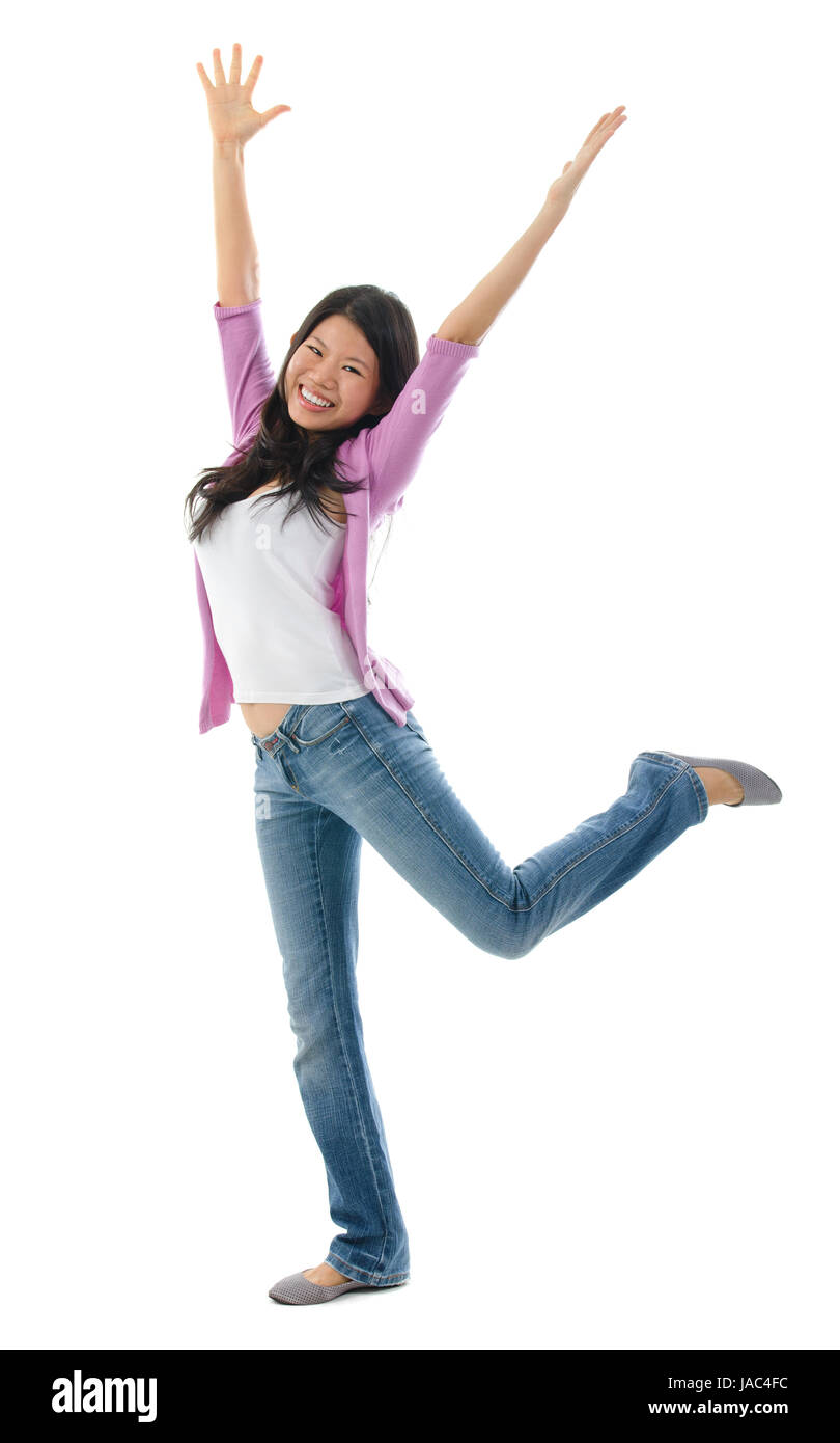 Happy Southeast Asian Chinese woman arms opened up. Full body standing ...