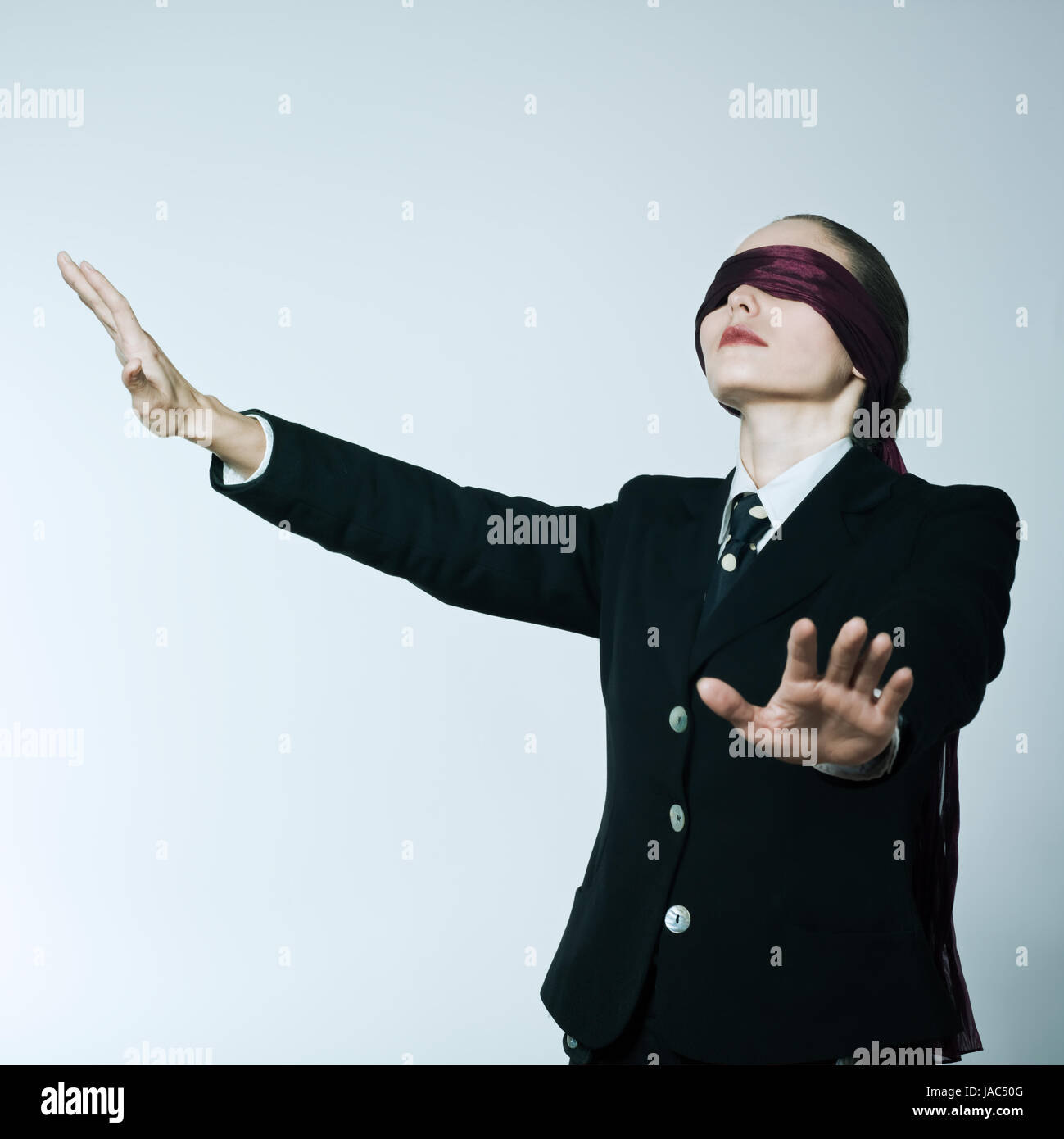 studio shot portrait of one caucasian young blindfold woman Stock Photo ...