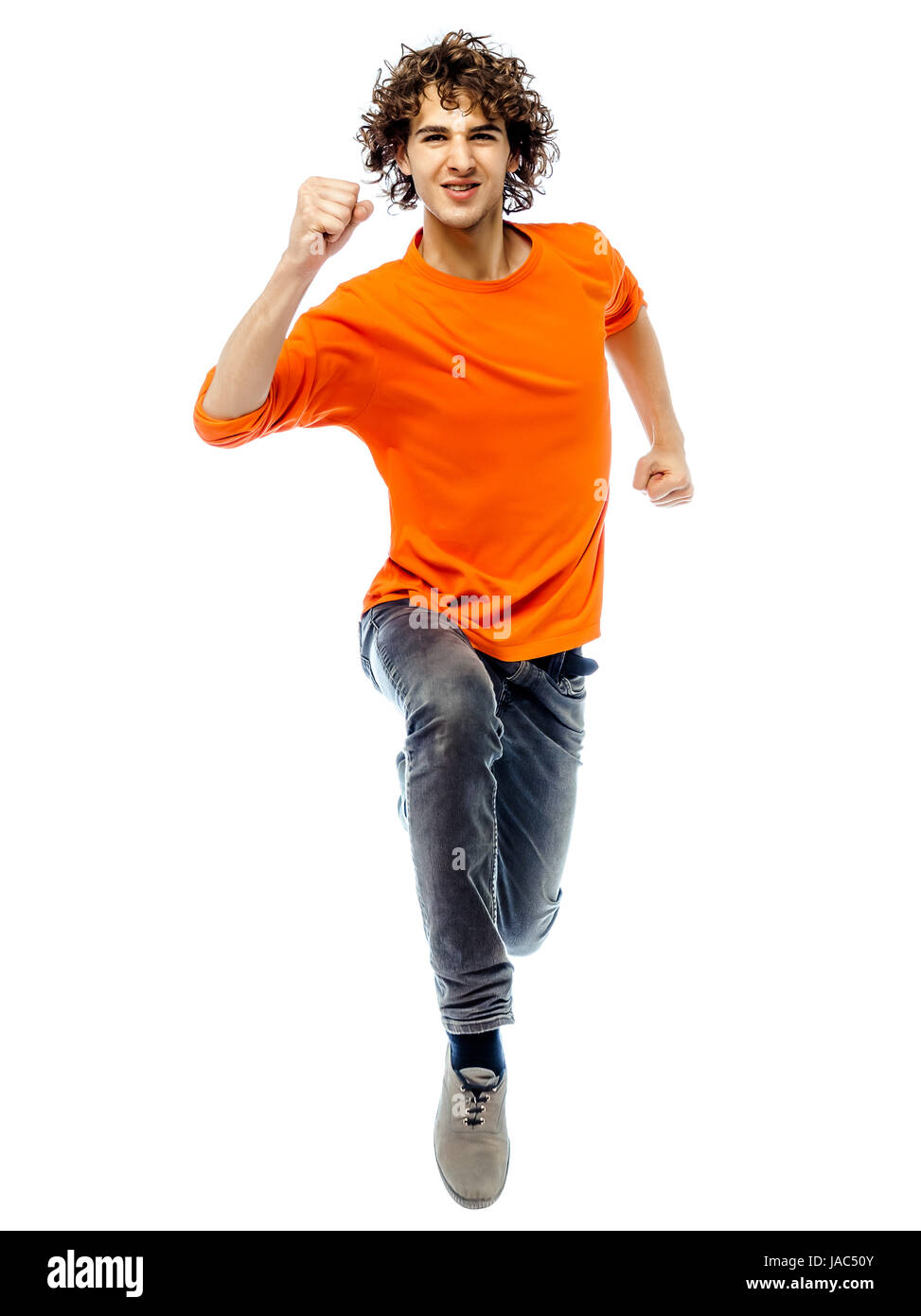 one young man caucasian running front view in studio white background ...