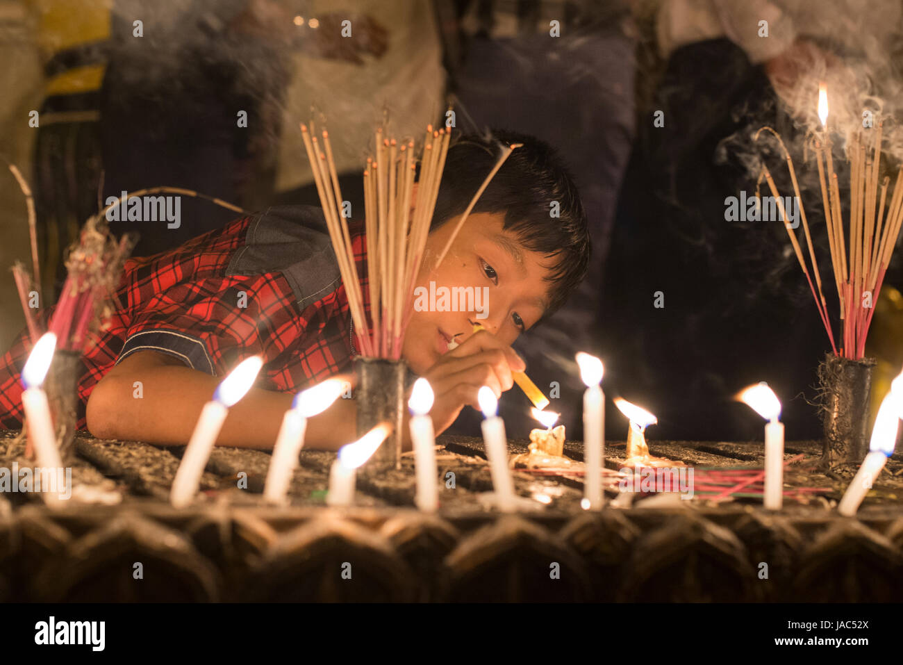 Buddhist myanmar candle hi-res stock photography and images - Alamy