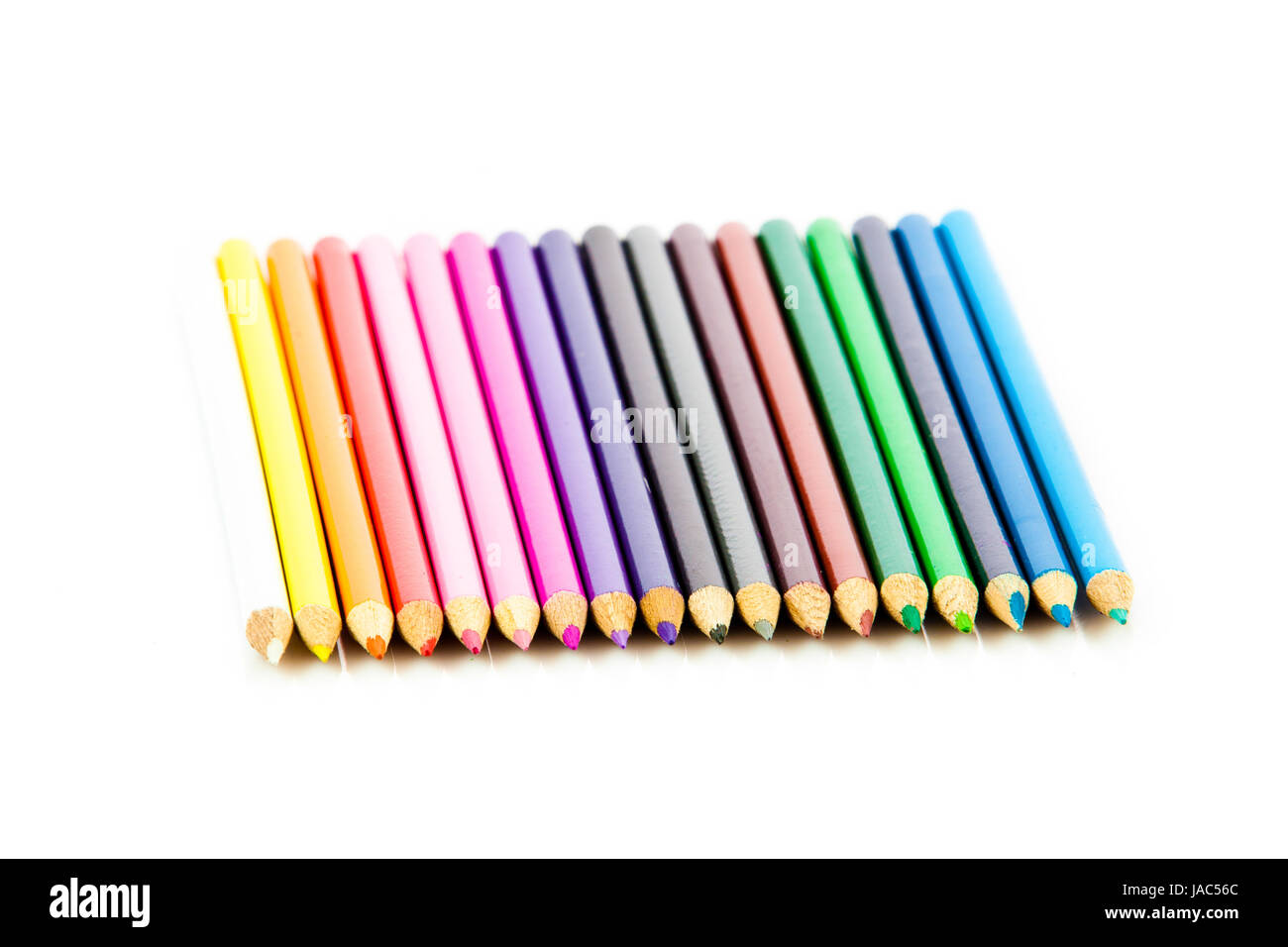 Colour pencils isolated on white background. Many different colored ...
