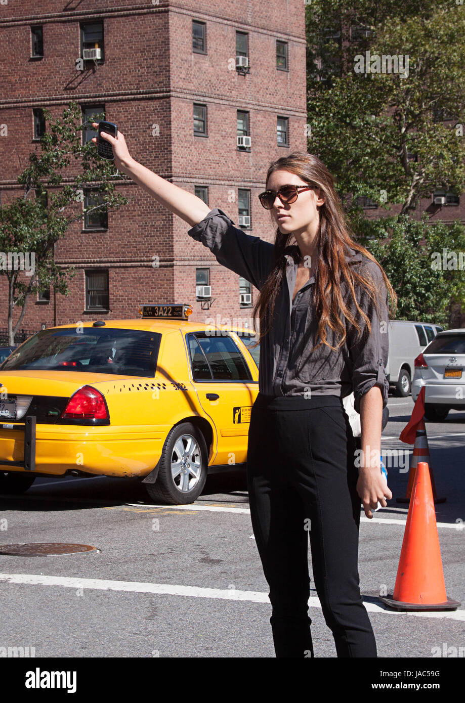 Waiting for a taxi hi-res stock photography and images - Alamy