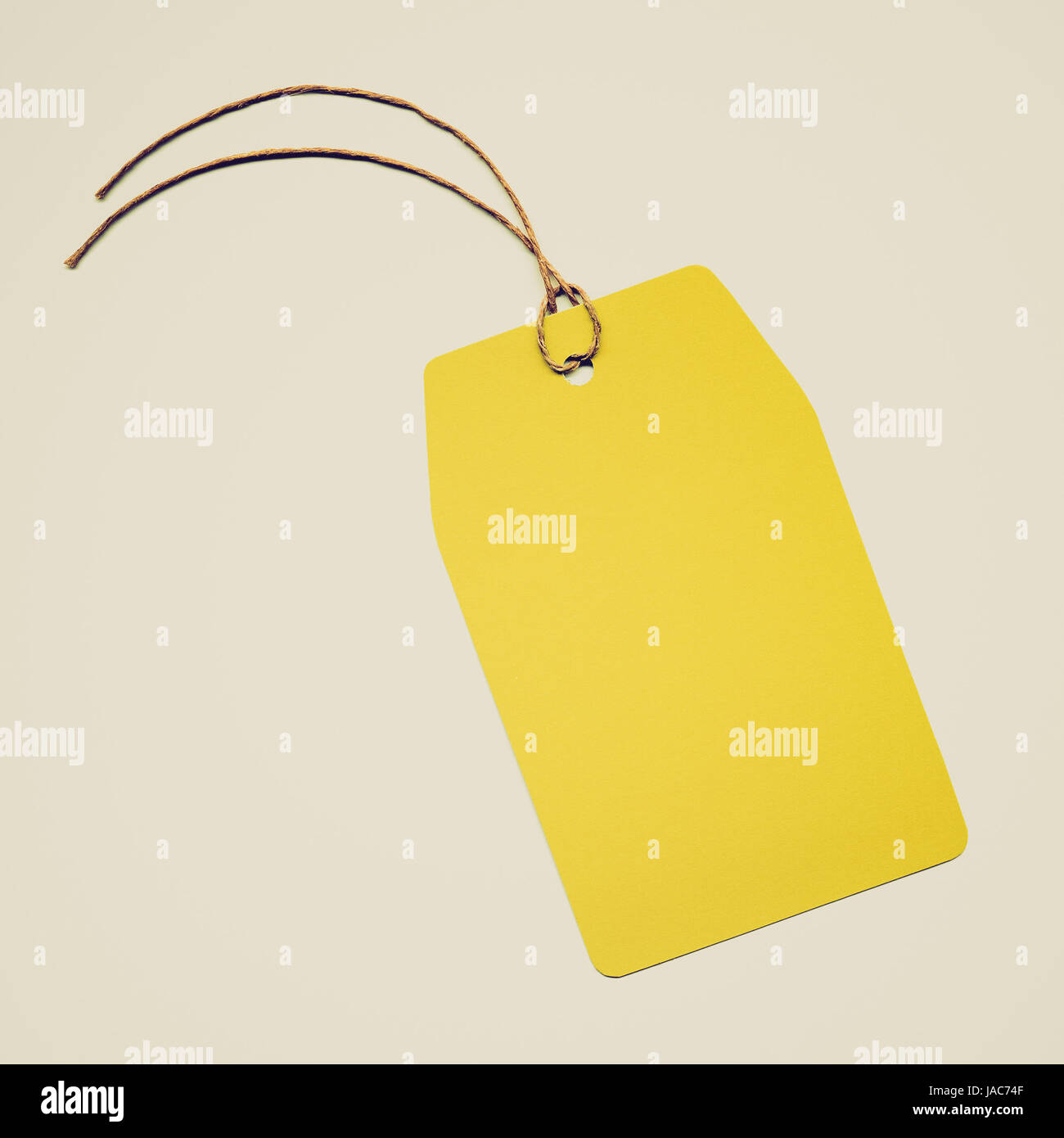 Vintage looking Price tag or address label with string Stock Photo - Alamy